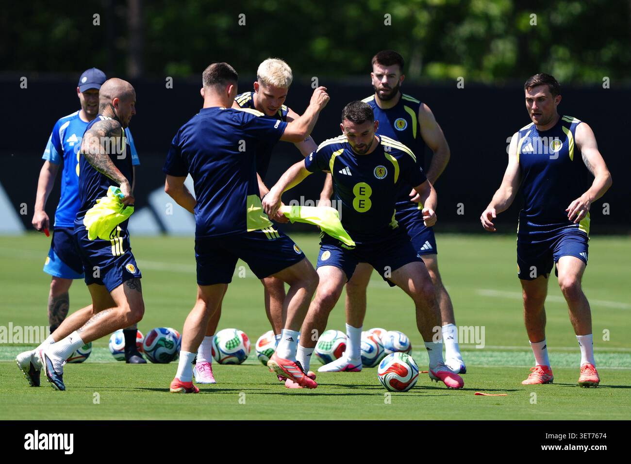 Scotland's John McGinn (centre) and team-mates during a training ...