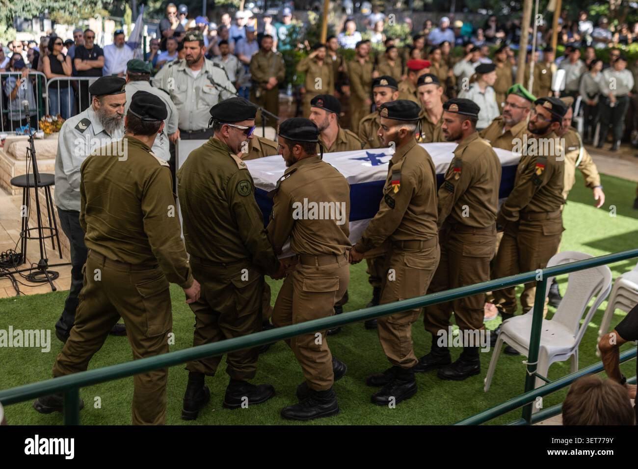 21 June 2026, Israel, Kefar Sava: Israeli soldiers carry the coffin of ...