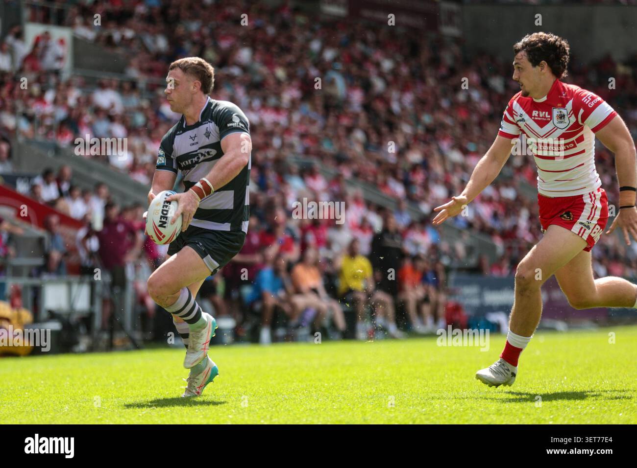 Asher O’Donnell makes a break during the BetFred Super League match ...