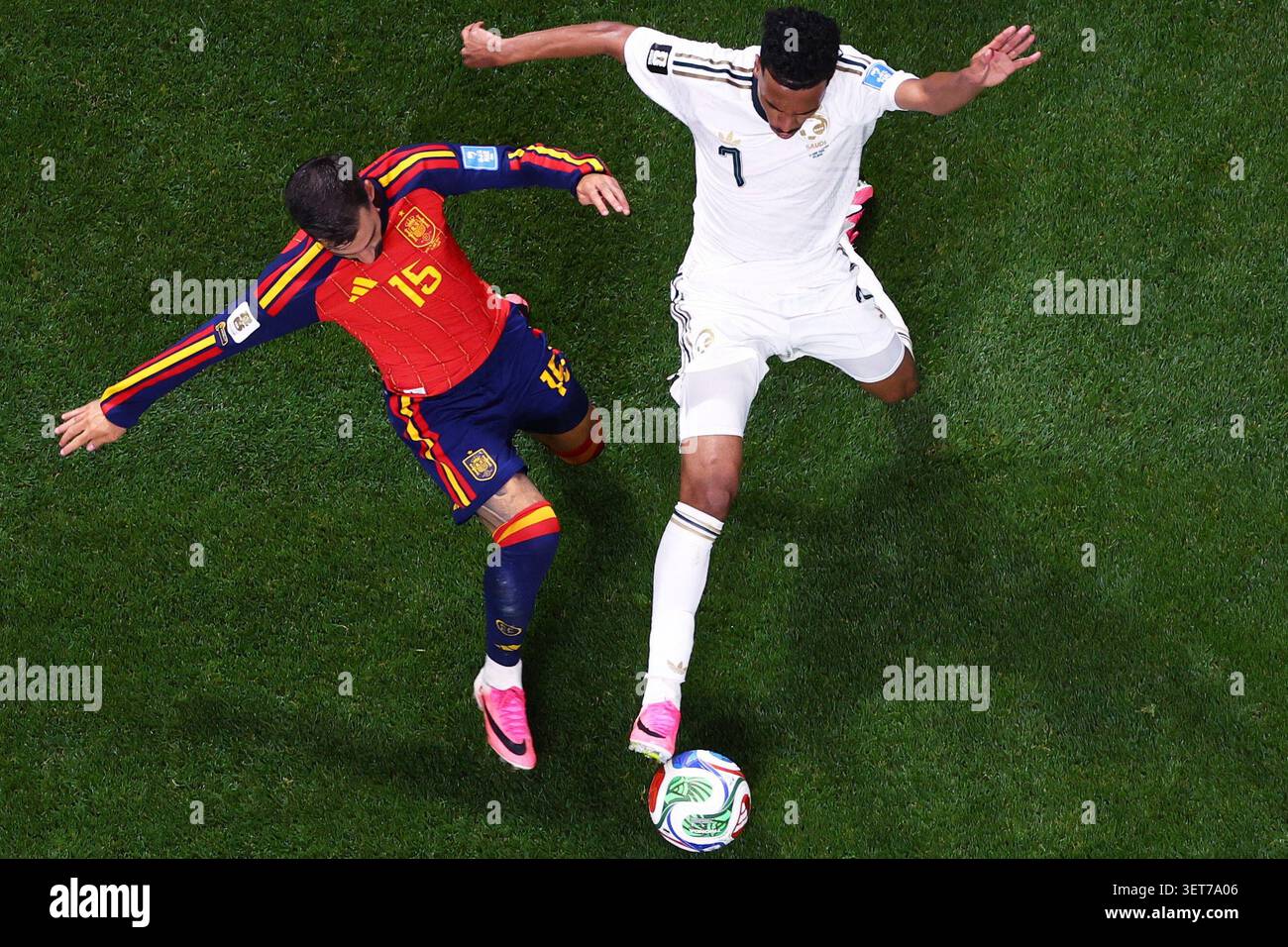 Saudi Arabia's Musab Aljuwayr (7) fights for the ball against Spain's ...