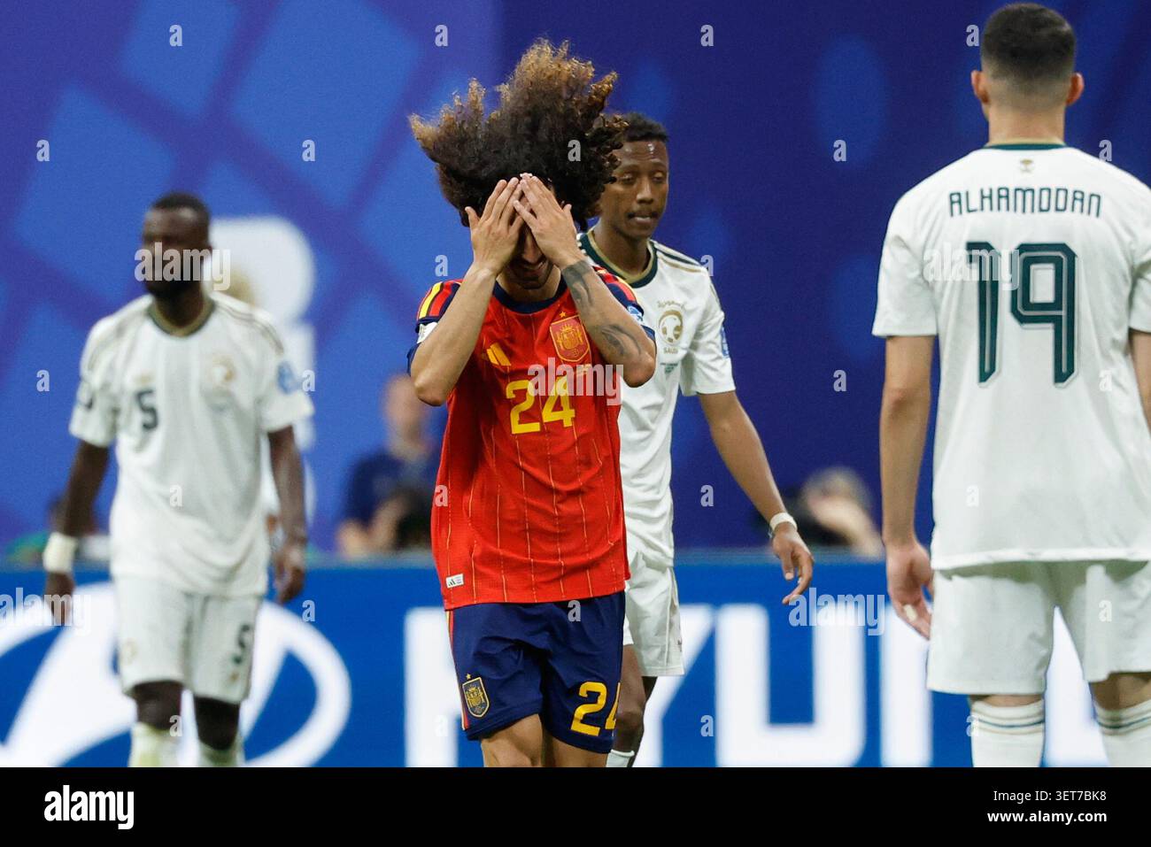 Spain's Marc Cucurella reacts after Saudi Arabia's Hassan Altambakti ...