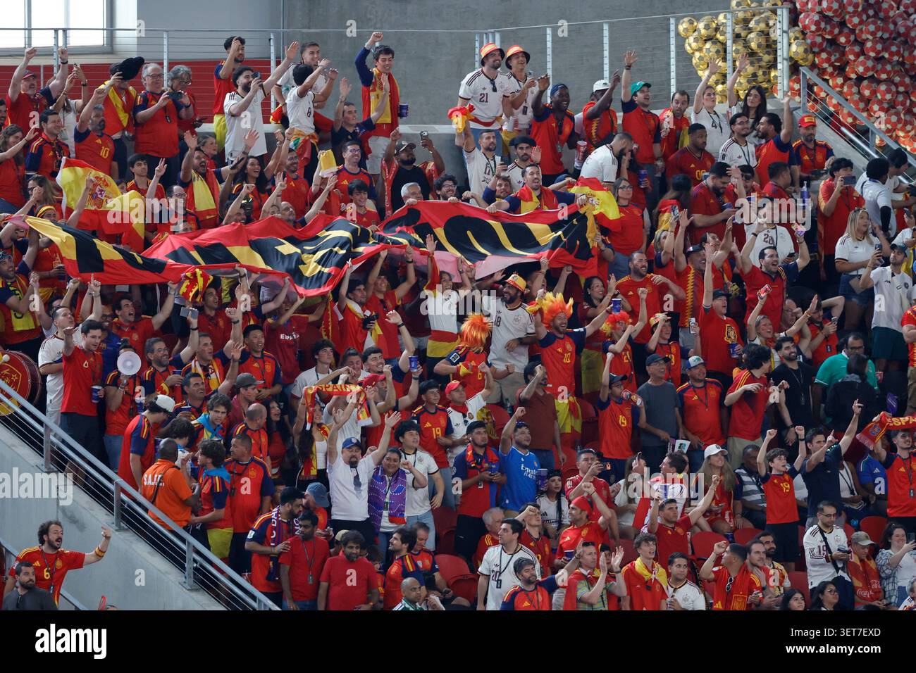 Fans of Spain cheer fo their team during the World Cup Group H soccer ...