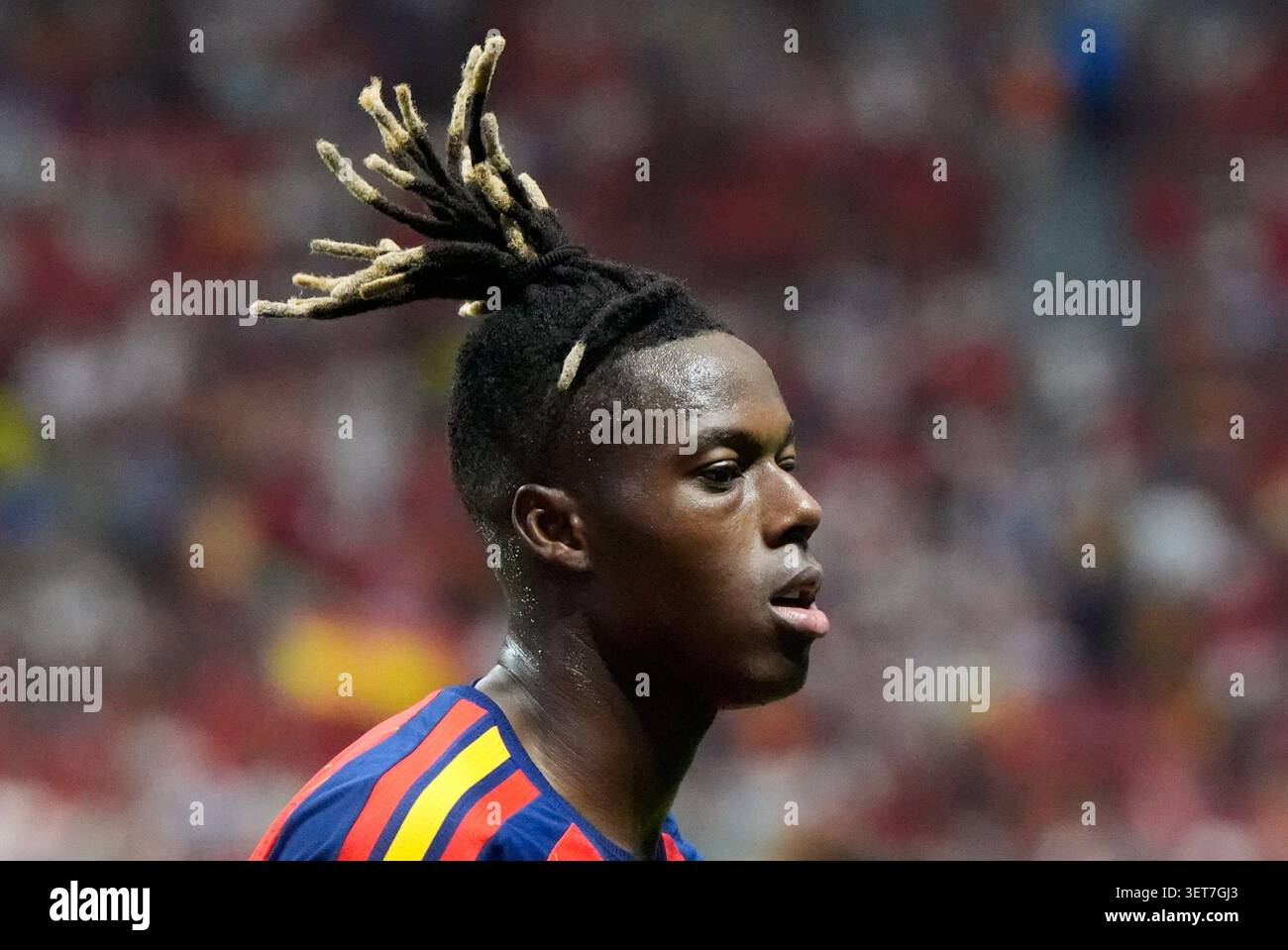 Spain's Nico Williams runs during the World Cup Group H soccer match ...