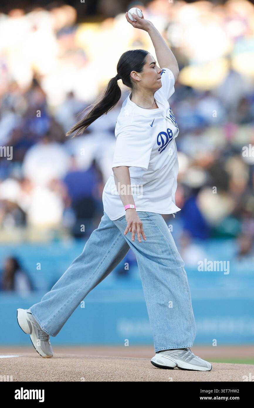 Los Angeles Sparks player Kelsey Plum throws out the ceremonial first ...