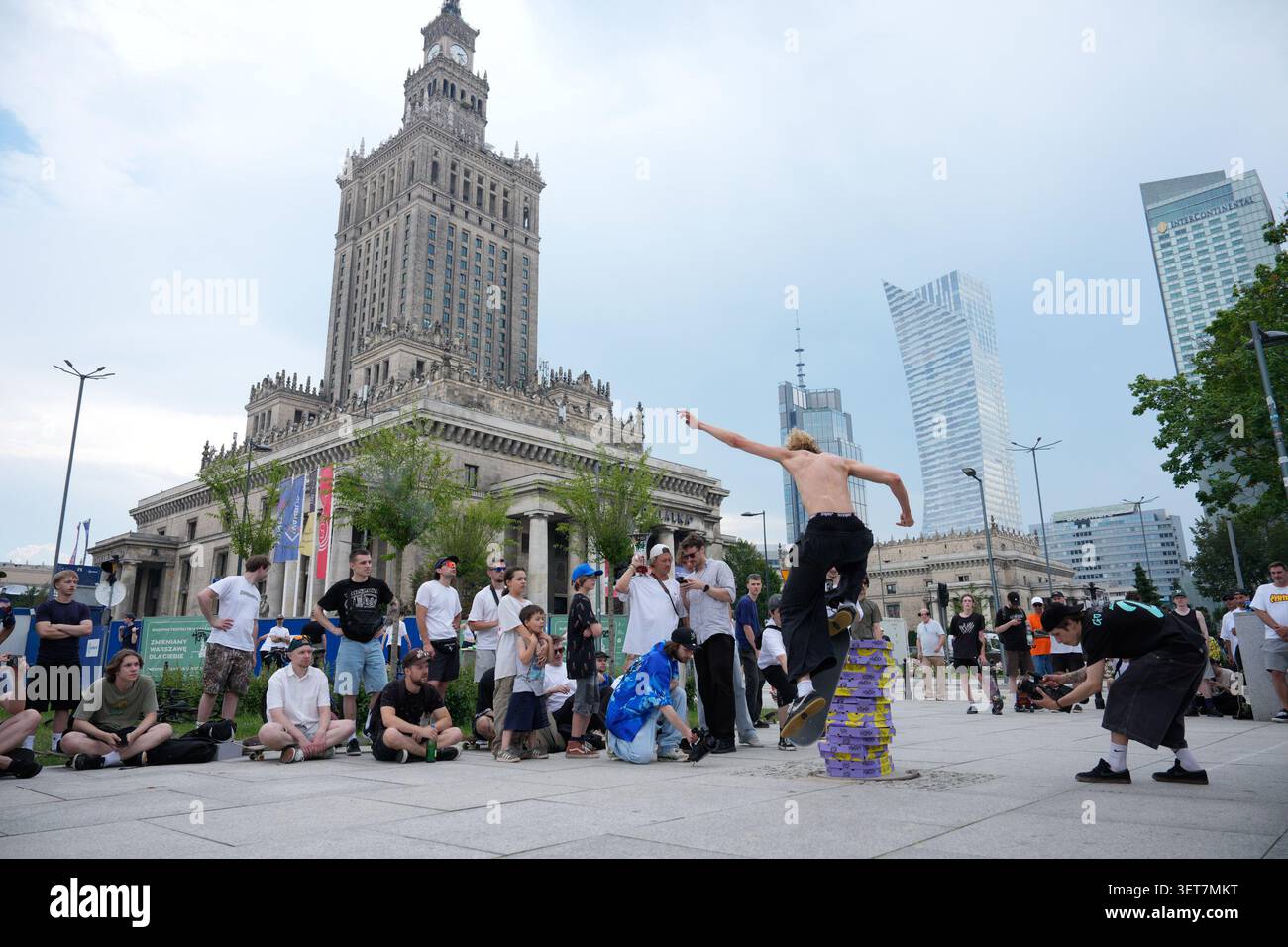Skateboarders are seen in central Warsaw, Poland on 21 June, 2026 ...