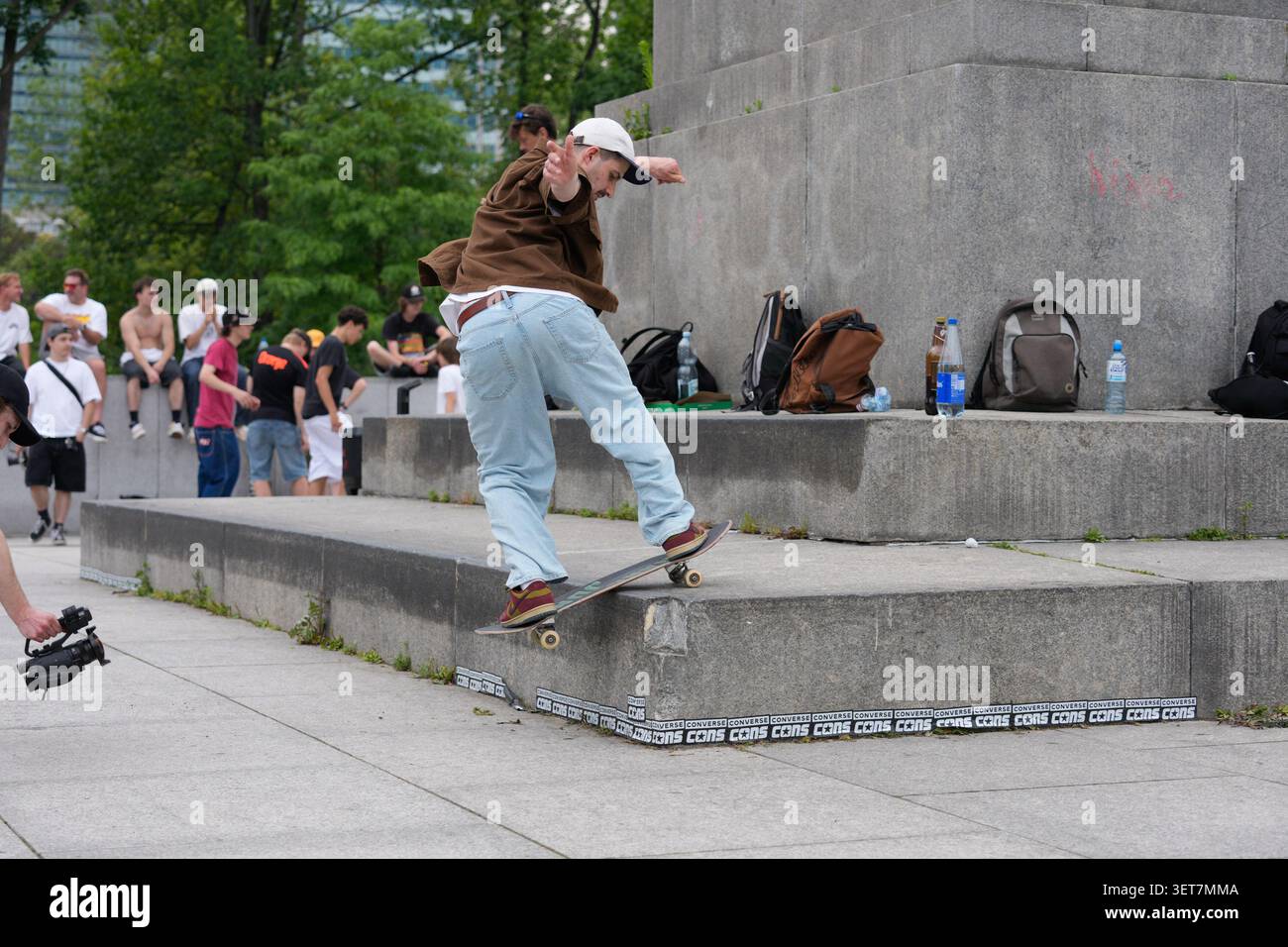 Skateboarders are seen in central Warsaw, Poland on 21 June, 2026 ...