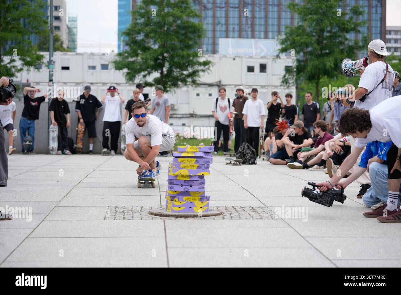 Skateboarders are seen in central Warsaw, Poland on 21 June, 2026 ...
