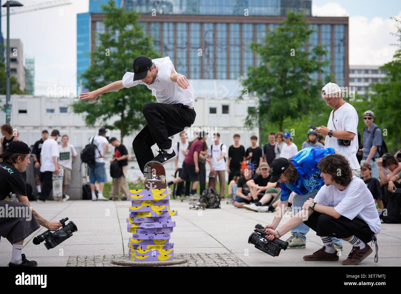 Skateboarders are seen in central Warsaw, Poland on 21 June, 2026 ...