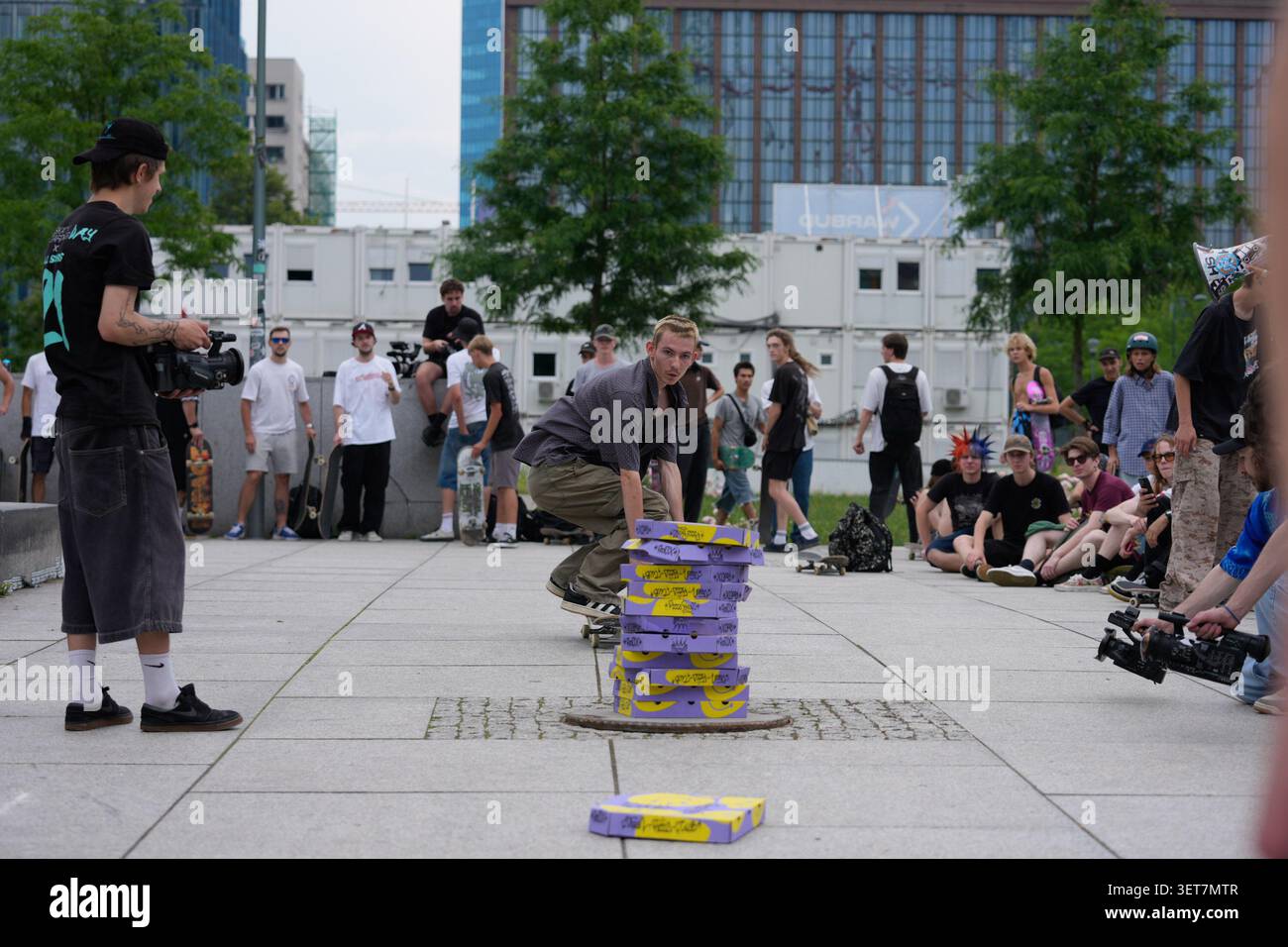 Skateboarders are seen in central Warsaw, Poland on 21 June, 2026 ...