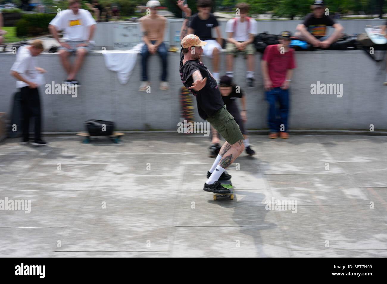 Skateboarders are seen in central Warsaw, Poland on 21 June, 2026 ...