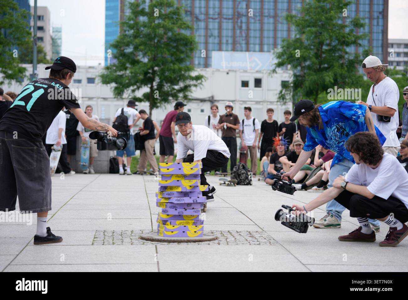 Skateboarders are seen in central Warsaw, Poland on 21 June, 2026 ...