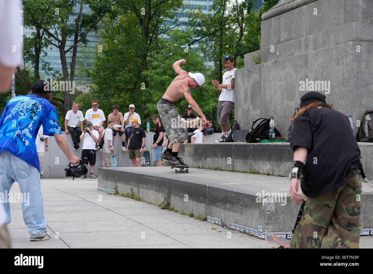 Skateboarders are seen in central Warsaw, Poland on 21 June, 2026 ...