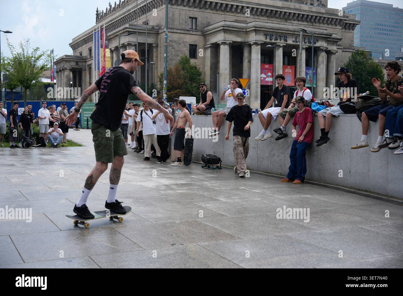 Skateboarders are seen in central Warsaw, Poland on 21 June, 2026 ...