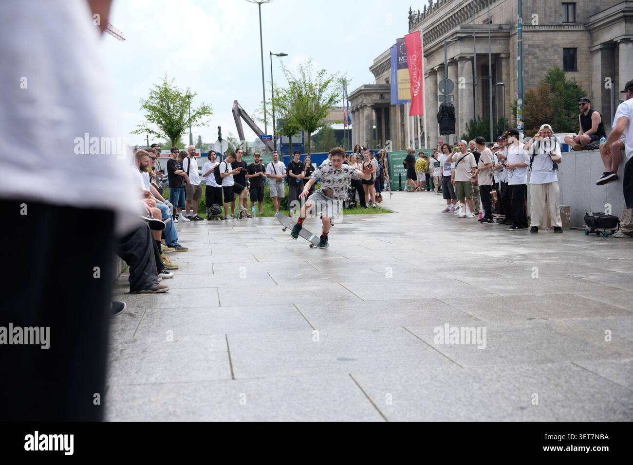 Skateboarders are seen in central Warsaw, Poland on 21 June, 2026 ...
