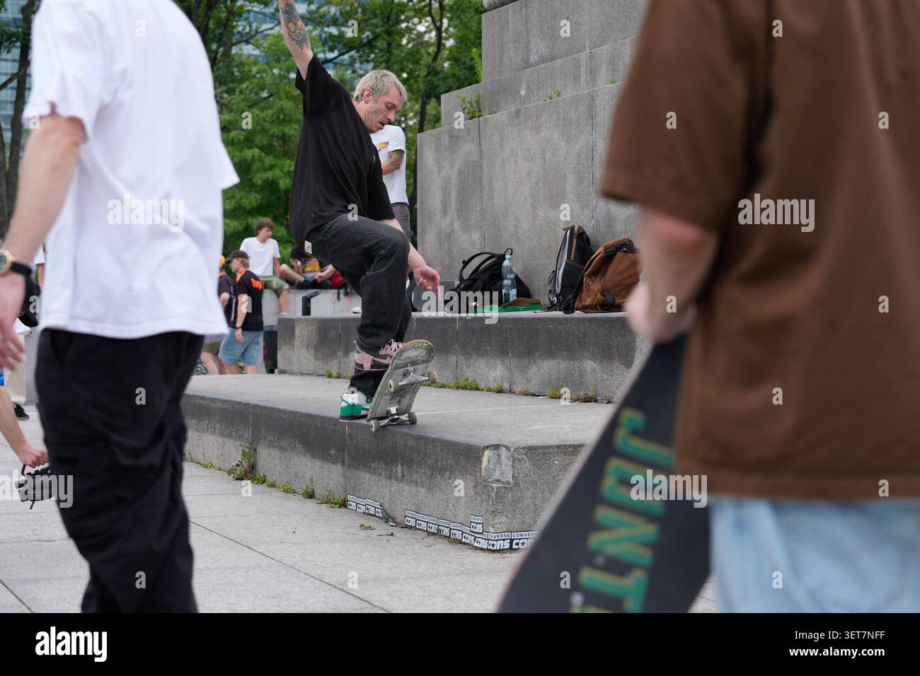 Skateboarders are seen in central Warsaw, Poland on 21 June, 2026 ...