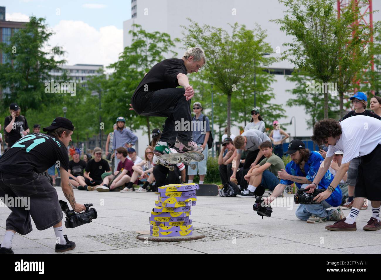 Skateboarders are seen in central Warsaw, Poland on 21 June, 2026 ...
