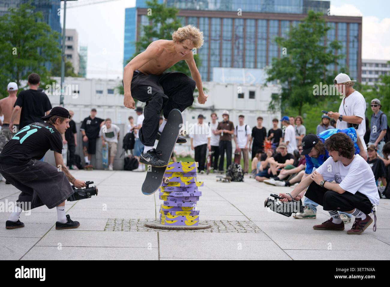 Skateboarders are seen in central Warsaw, Poland on 21 June, 2026 ...