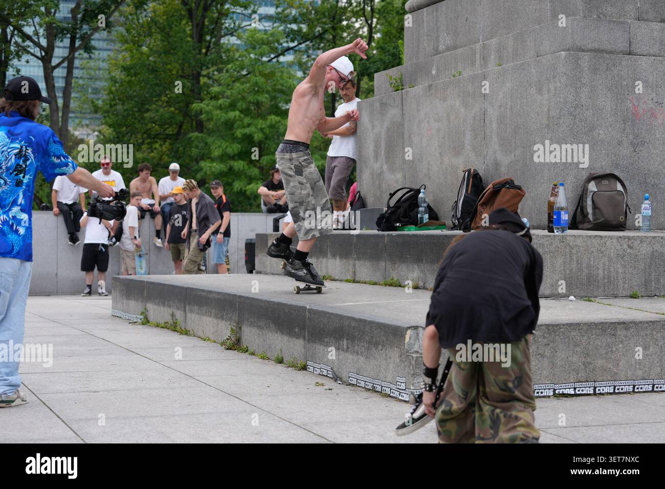 Skateboarders are seen in central Warsaw, Poland on 21 June, 2026 ...