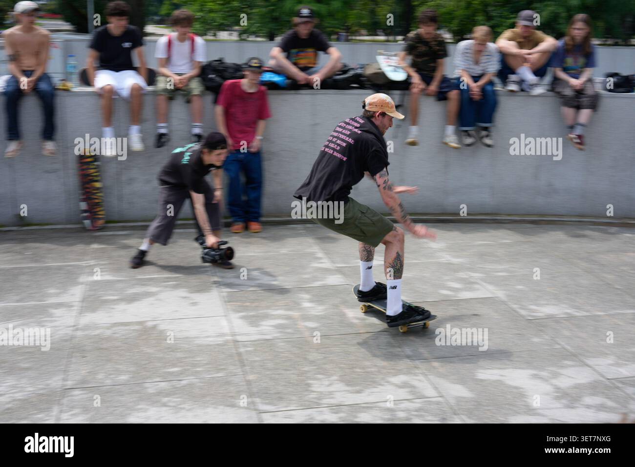 Skateboarders are seen in central Warsaw, Poland on 21 June, 2026 ...