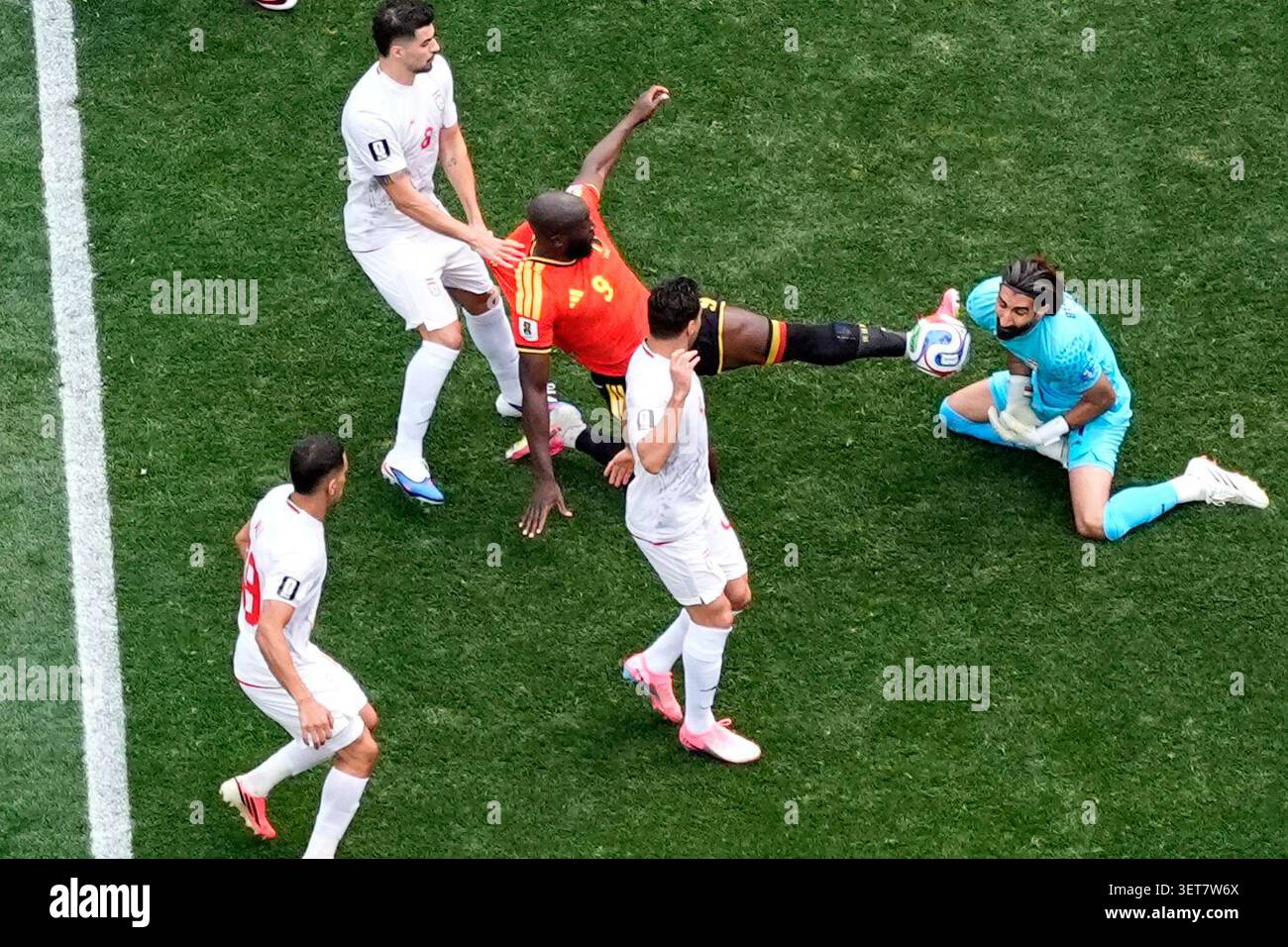 Belgium's Romelu Lukaku (9) challenges Iran goalkeeper Alireza ...