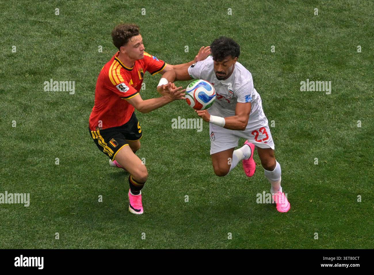 Belgium's Maxim De Cuyper (5) and Iran's Ramin Rezaeian (23) fight for ...