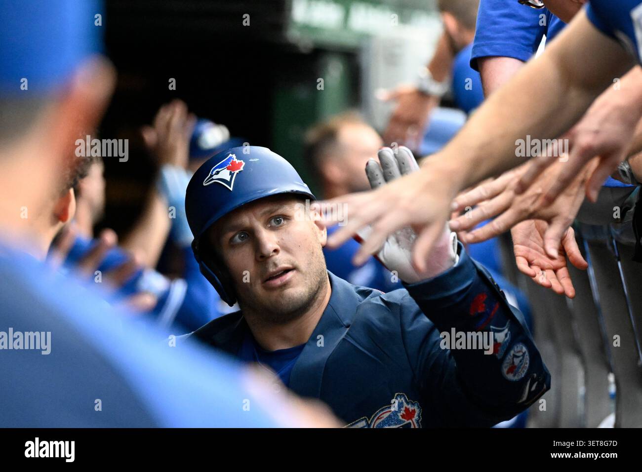 Toronto Blue Jays' Daulton Varsho celebrates in the dugout after ...