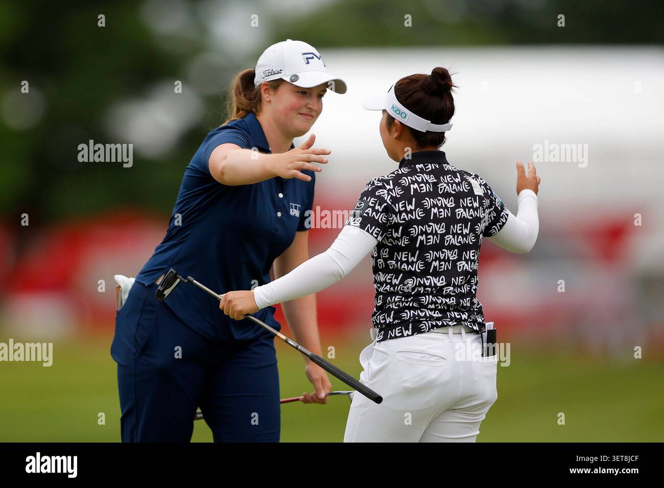 Lottie Woad, of England, left, and Miyu Yamashita, right, of Japan ...