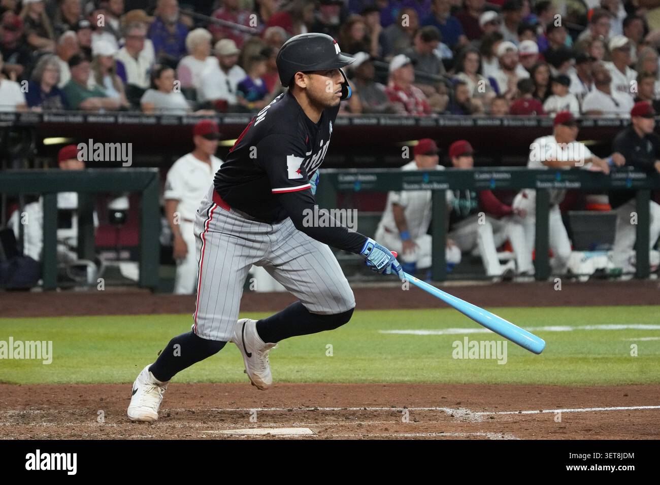 Minnesota Twins' Alex Jackson watches his RBI single against the ...