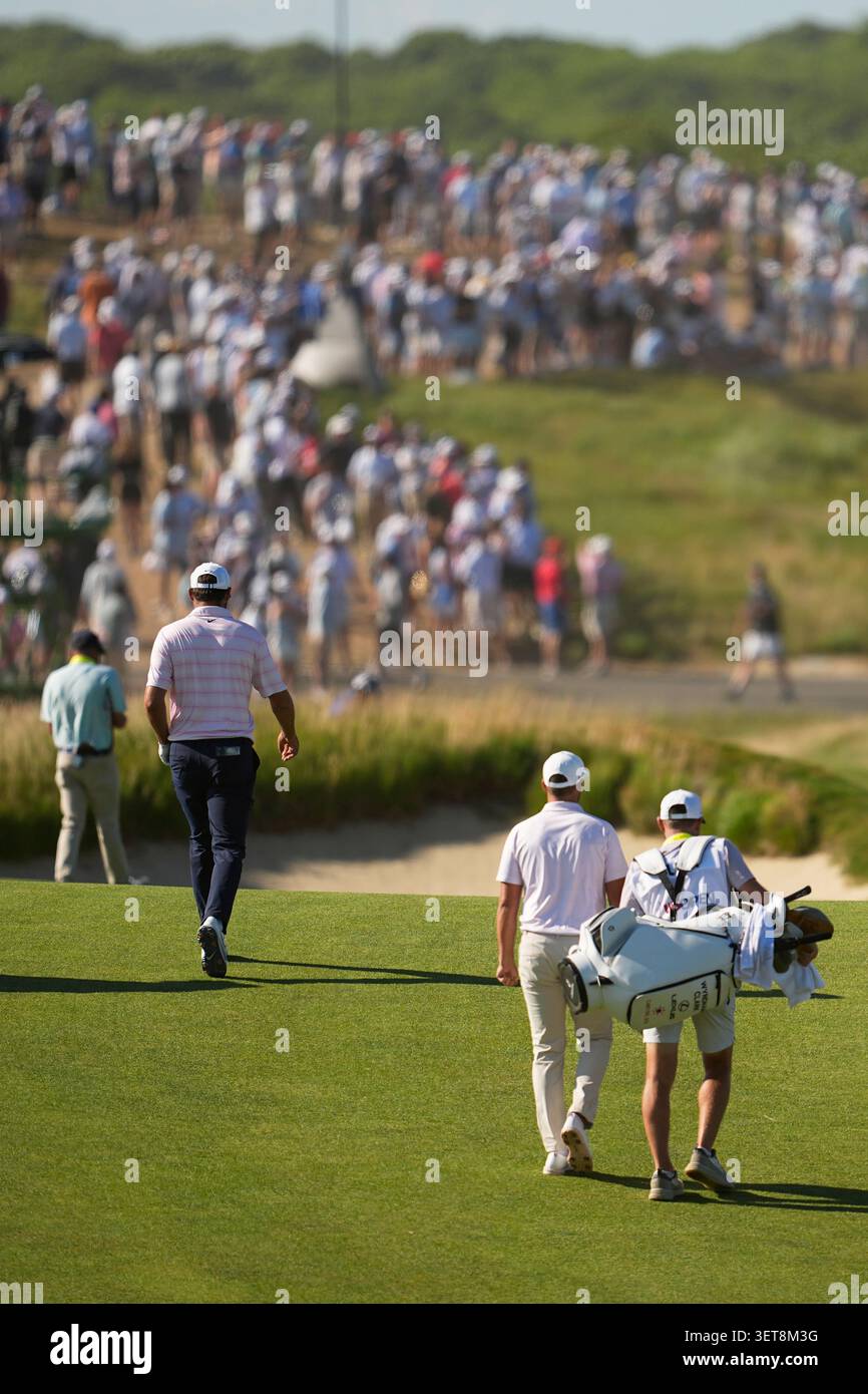 Scottie Scheffler and Wyndham Clark walk to green on the 12th hole ...