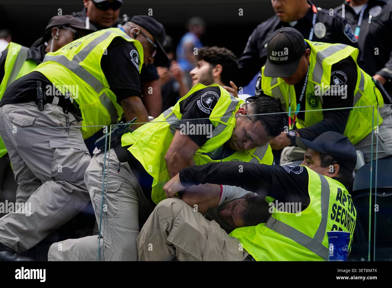 Security scuffle with an Iranian fan at the end of the World Cup Group ...