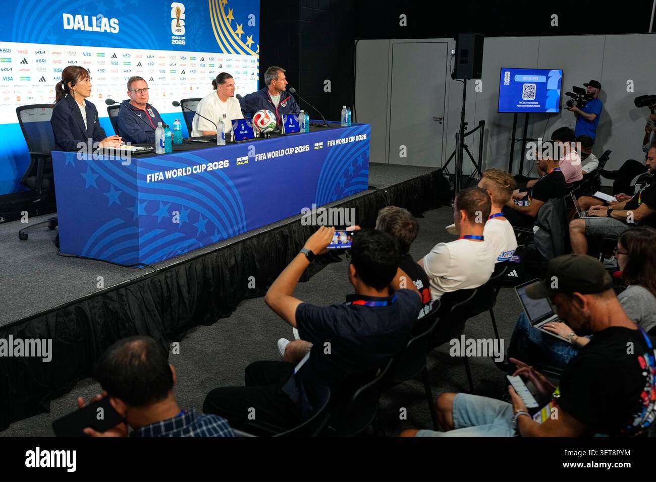 Austria's Marcel Sabitzer, second from right at table, responds to a ...