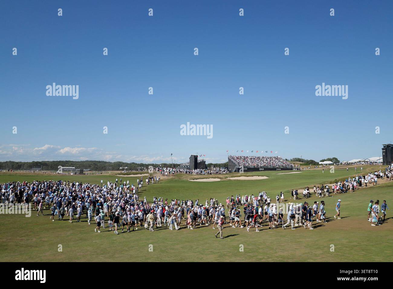 Fans cross the 9th fairway during the final round of the 126th U.S ...