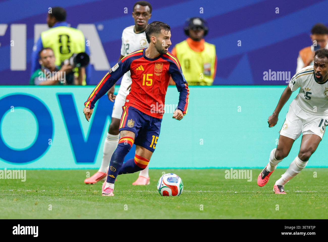 Spain's Alex Baena dribbles the ball during the World Cup Group H ...
