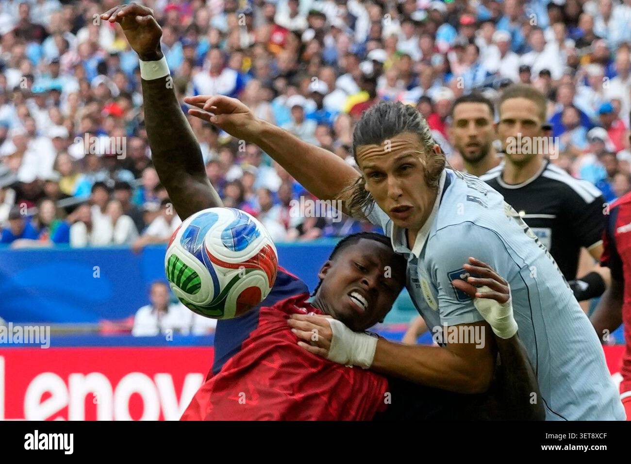 Cape Verde's Sidny Lopes Cabral, left, and Uruguay's Agustin Canobbio ...