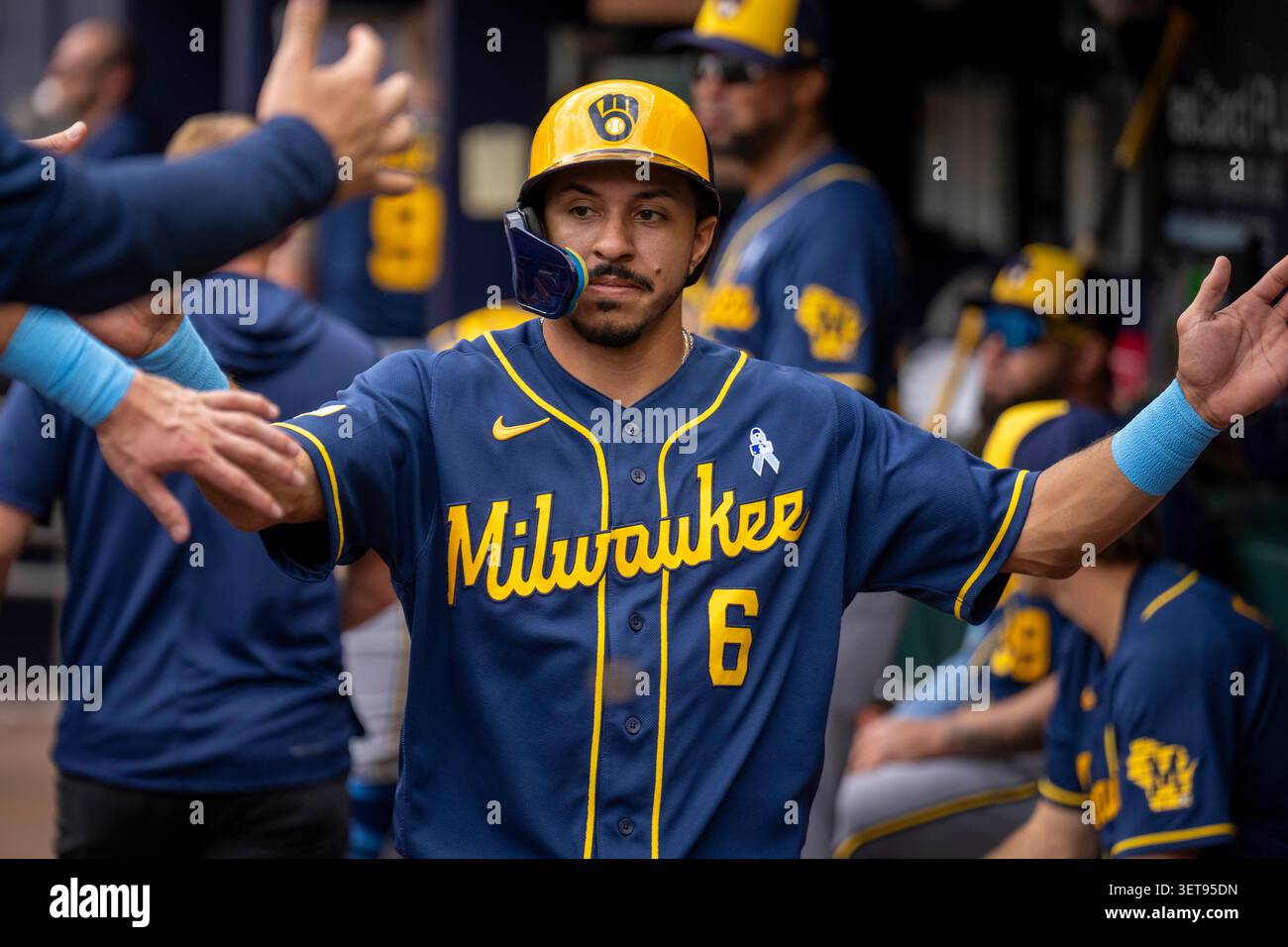 Milwaukee Brewers David Hamilton celebrates with his teammates during ...