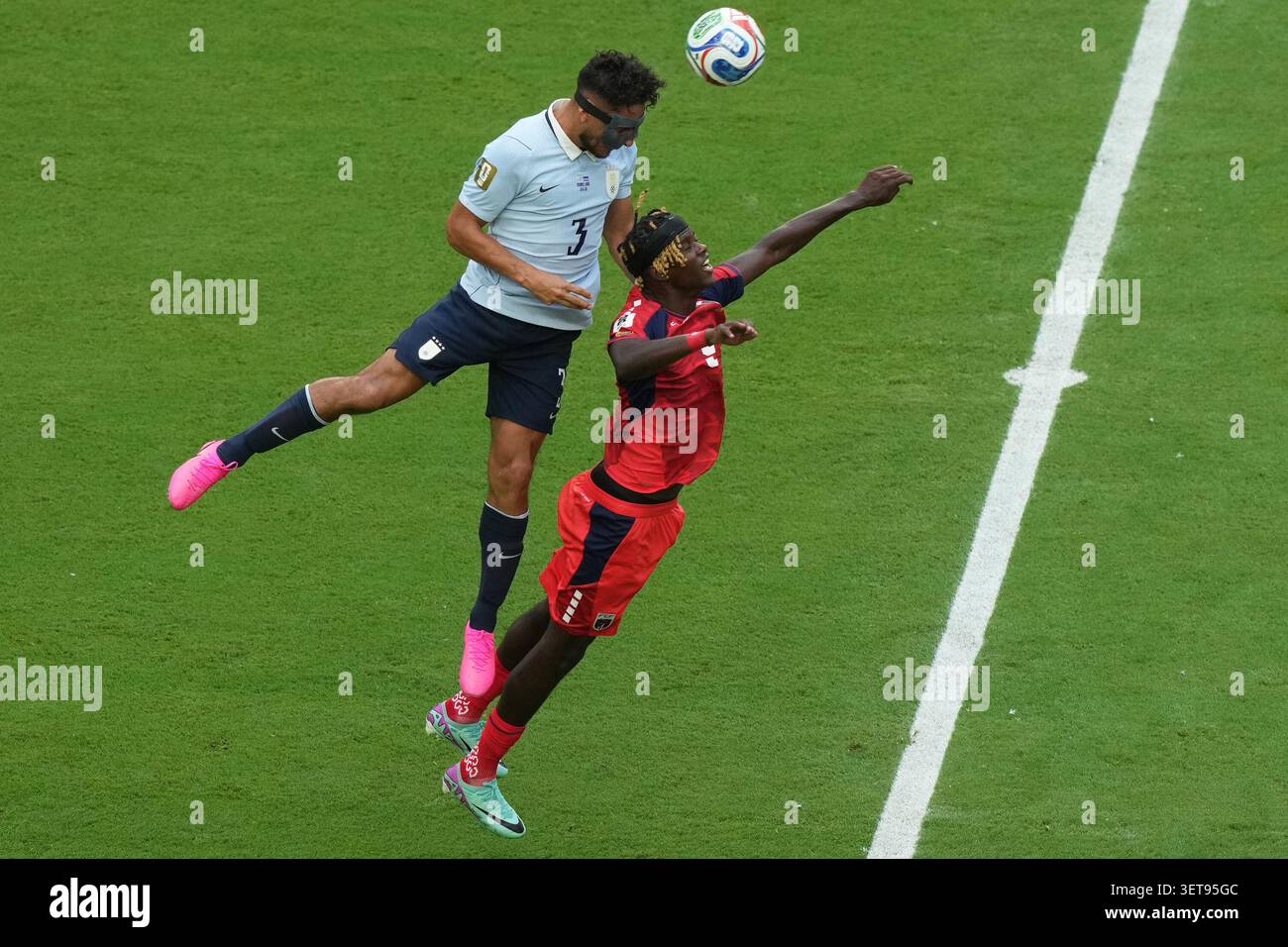 Uruguay's Sebastian Caceres, left, and Cape Verde's Gilson Benchimol go ...