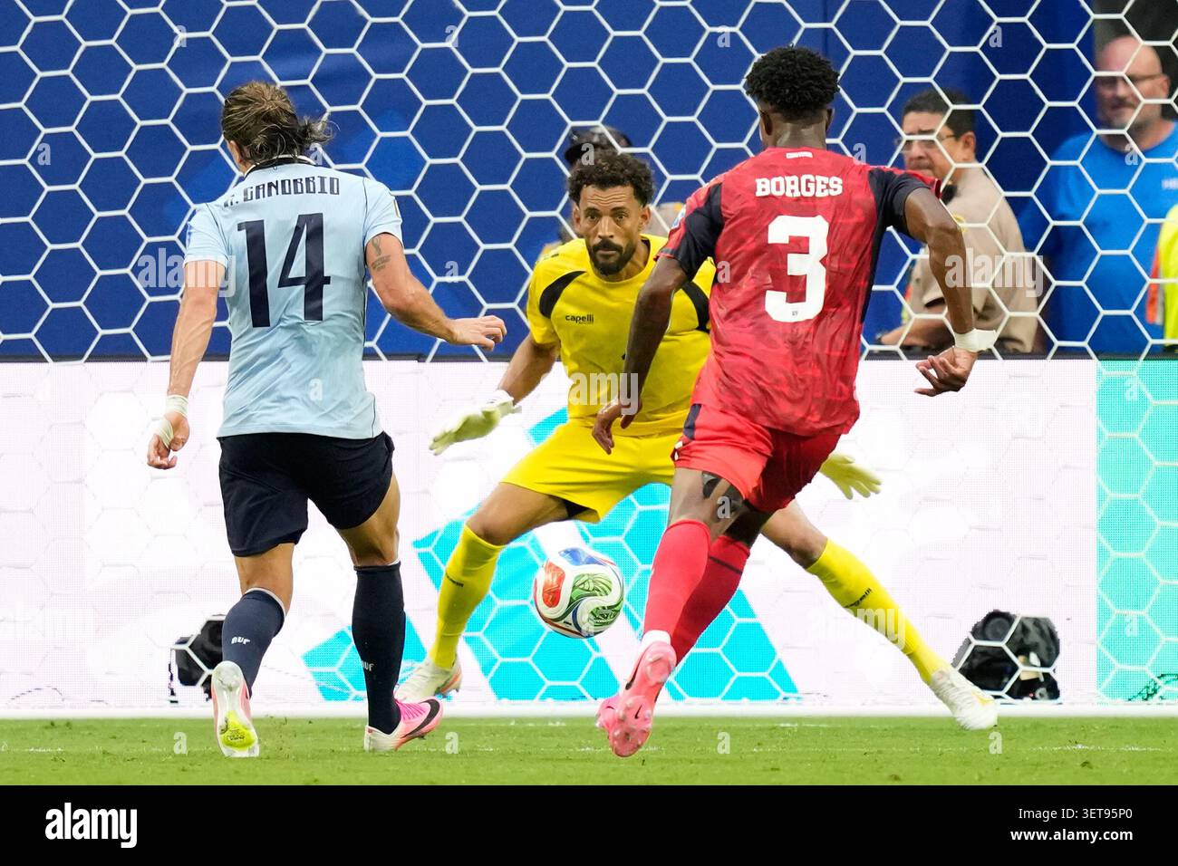 Uruguay's Agustin Canobbio (14) scores his team's second goal during ...