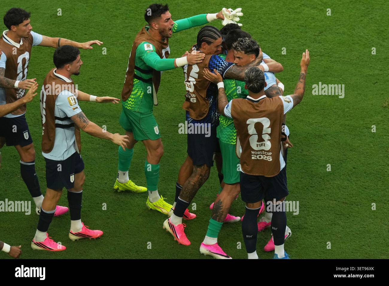 Uruguay's Maxi Araujo, right, celebrates with teammates after scoring ...