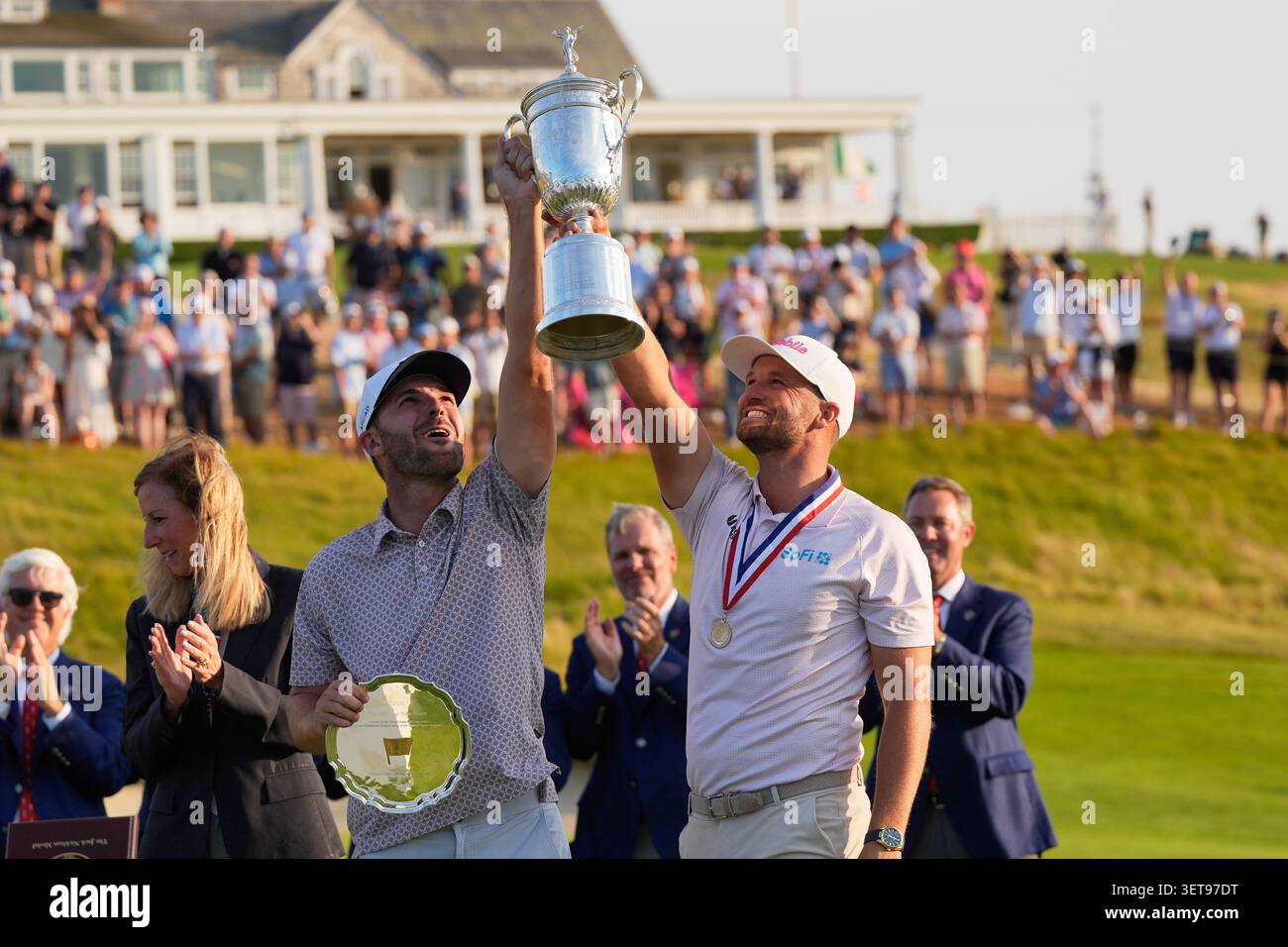 Wyndham Clark celebrates with his caddie David Pelekoudas after winning ...