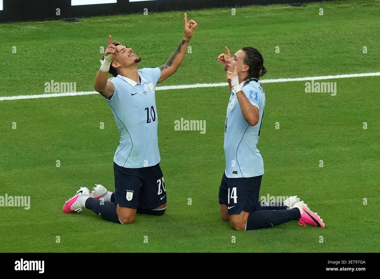 Uruguay's Agustin Canobbio, right, celebrates with Uruguay's Maxi ...
