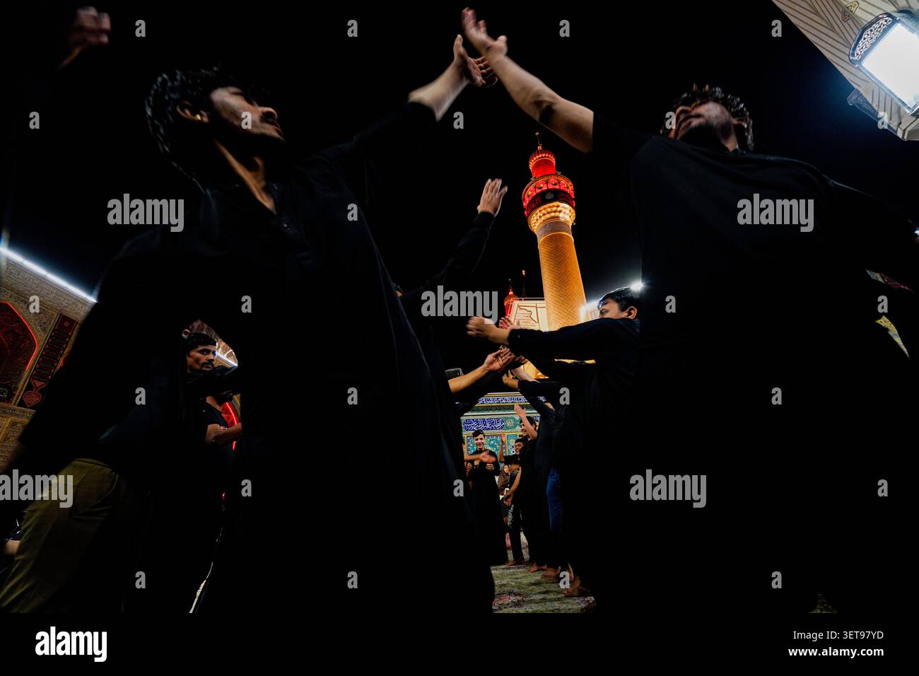 Shiites participate in Muharram processions of the Imam Ali shrine in ...