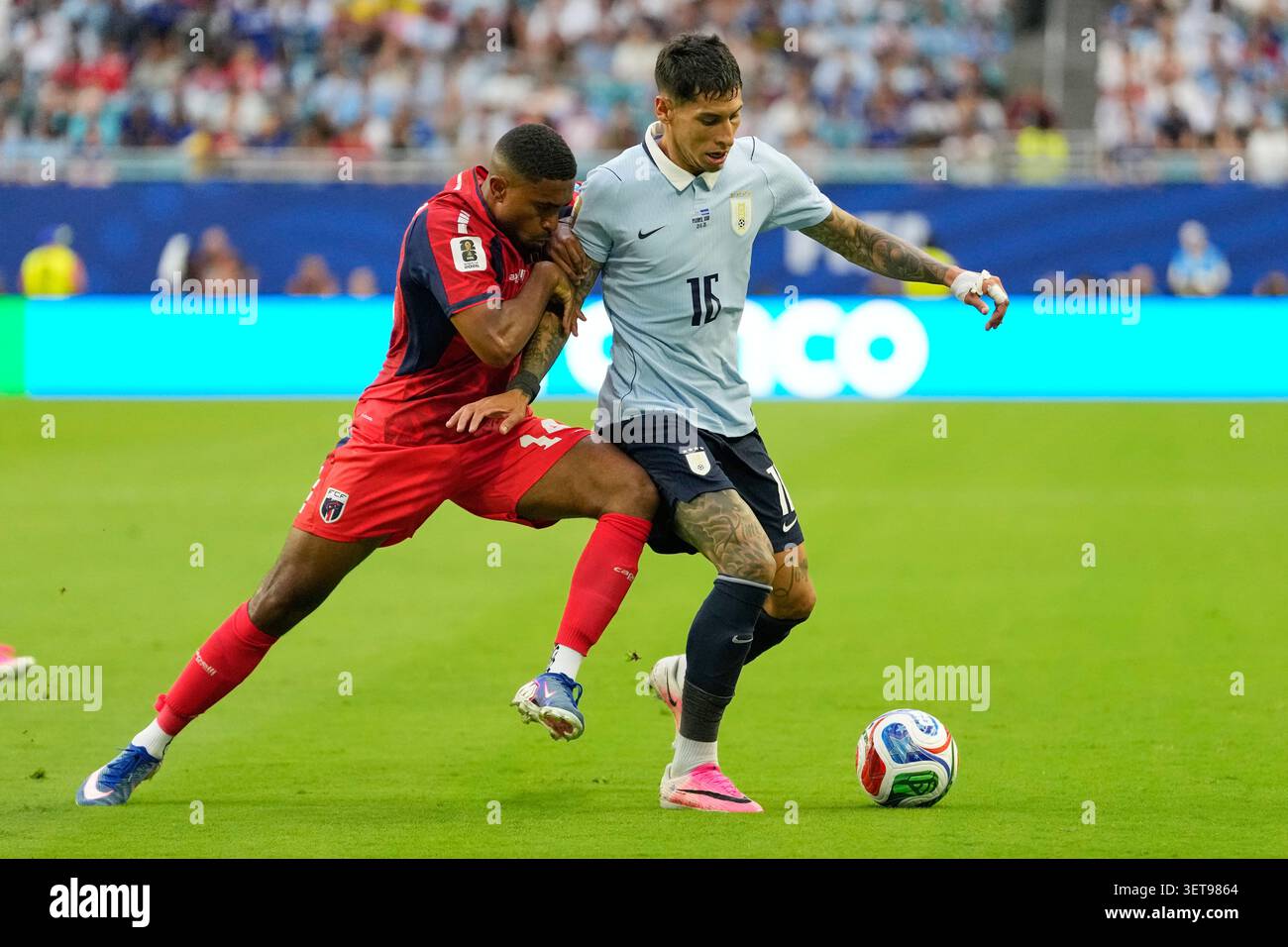 Cape Verde's Deroy Duarte (14) and Uruguay's Mathias Olivera (16 ...