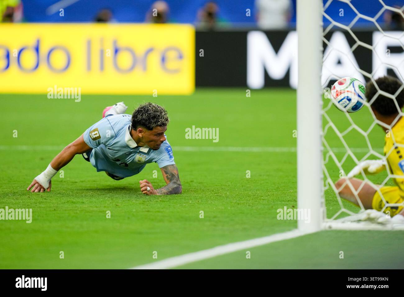 Maxi Araujo (Uruguay) scores the team's first goal during the FIFA ...