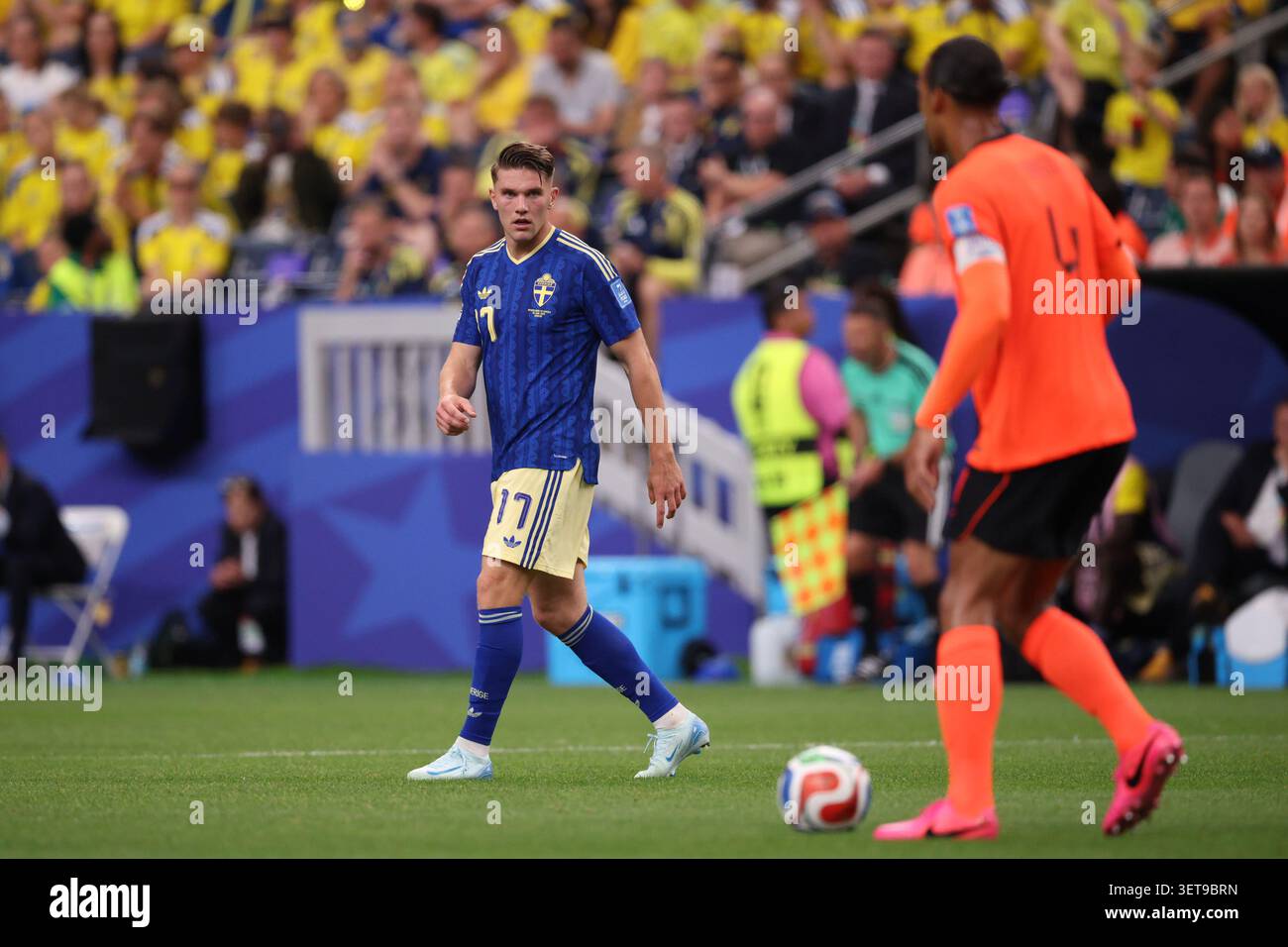 Viktor Gyokeres of Sweden watches Virgil van Dijk of Netherlands during ...