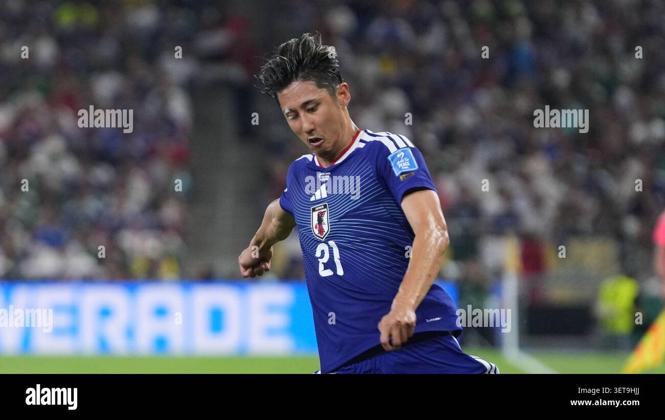 Japan's Hiroki Ito (21) passes the ball during the World Cup Group F ...