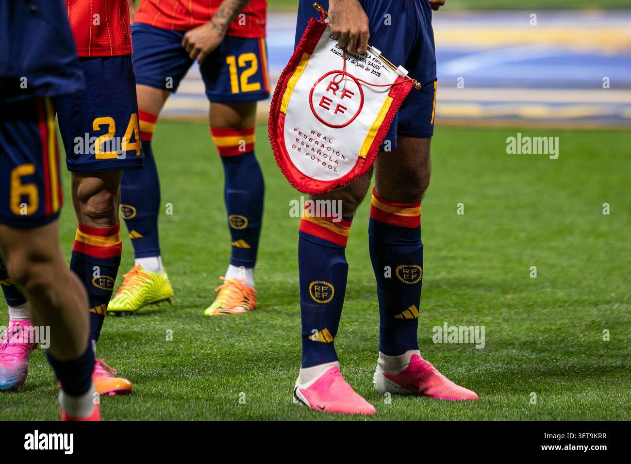 Spain midfielder Rodri (16) holds the match banner before the game ...