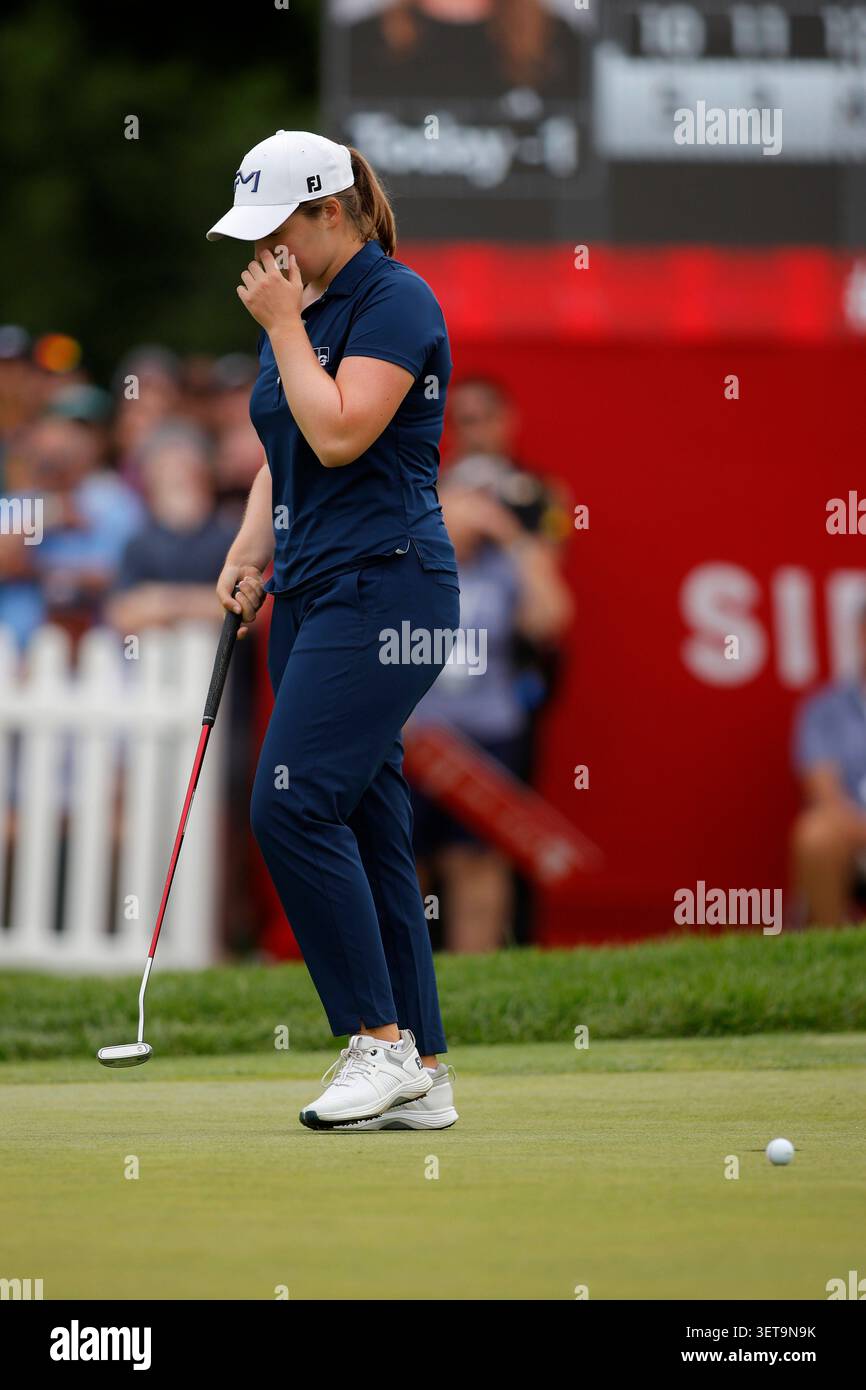 Lottie Woad, of England, reacts after her putt lipped out on the 18th ...