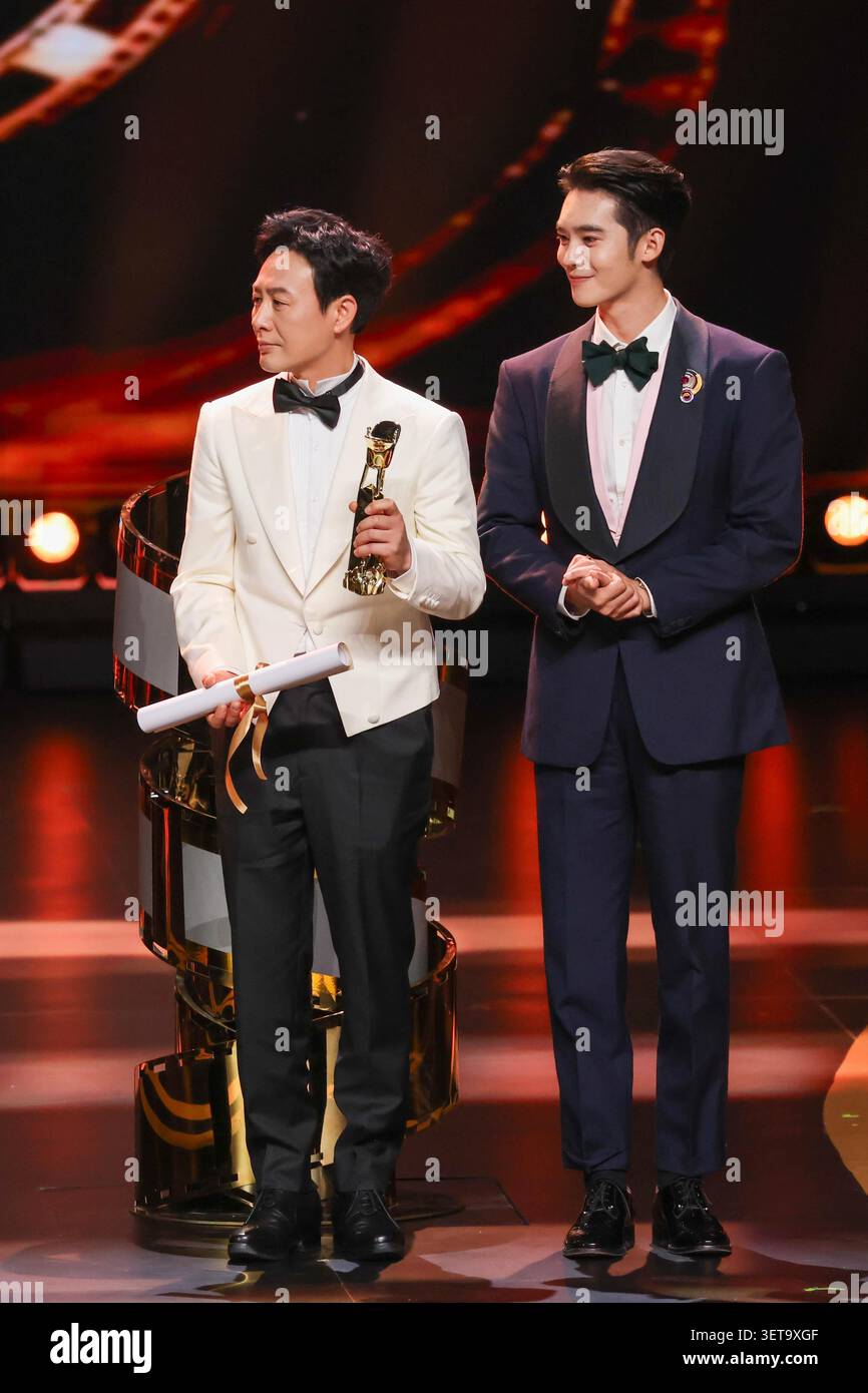 Chinese actors Carina Lau and Yu Shi present awards during the 28th ...