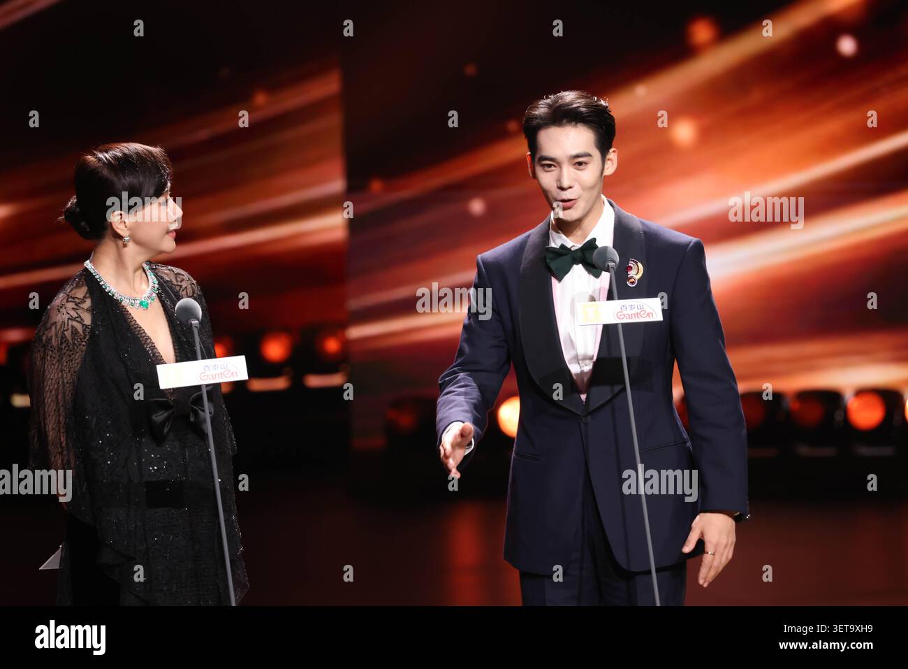 Chinese actors Carina Lau and Yu Shi present awards during the 28th ...