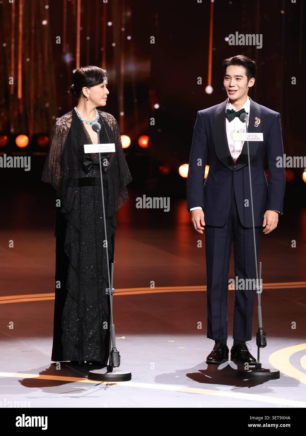 Chinese actors Carina Lau and Yu Shi present awards during the 28th ...